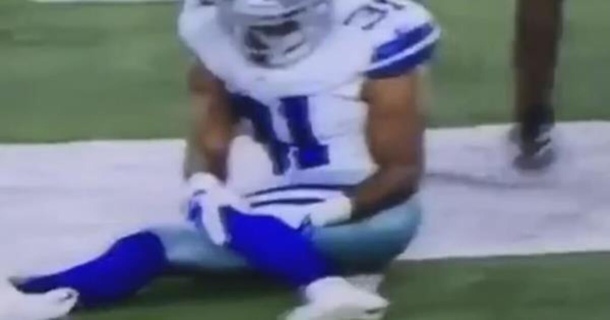 Watch this American footballer pop his dislocated knee back into place
