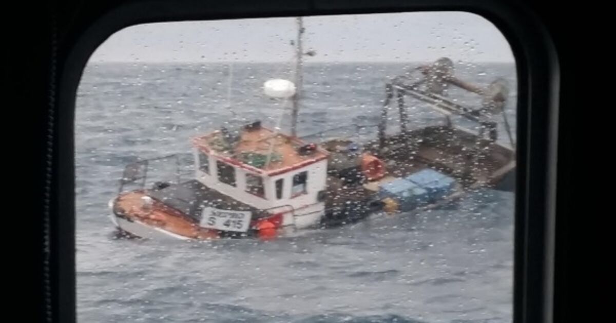 VIDEO: Two men rescued from sinking boat off Cork coast