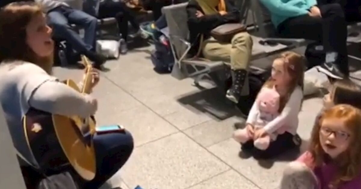 VIDEO: Impromptu sing-song breaks out in Dublin airport during six-hour ...
