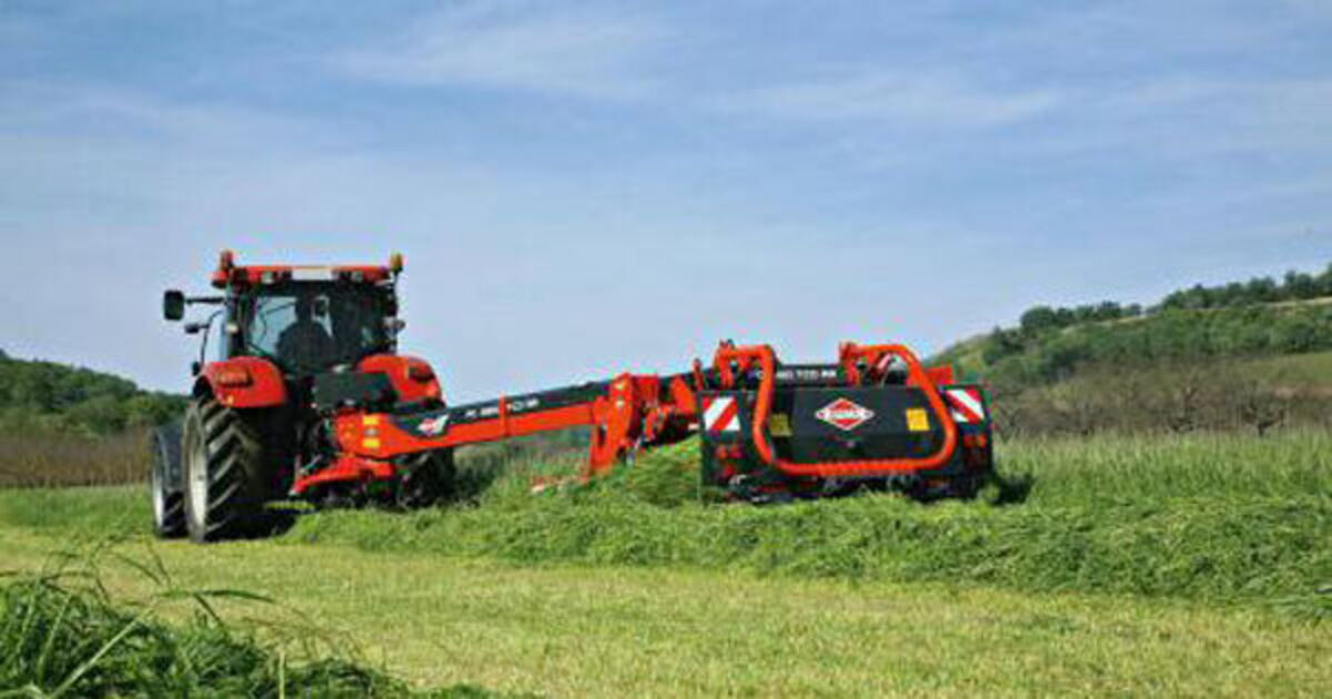 Conveyor added to centre pivot mower for increased forage harvester output