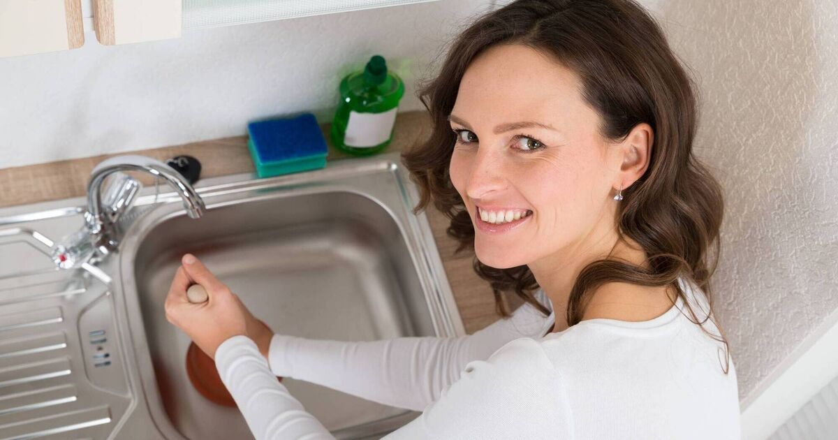How do I unblock a kitchen sink without using toxic chemicals?