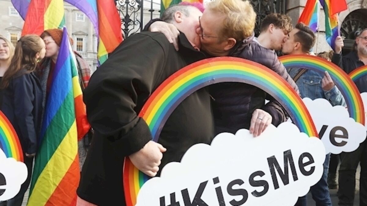 LGBT community hold 'kissing' protest outside Dáil against 'frightening ...
