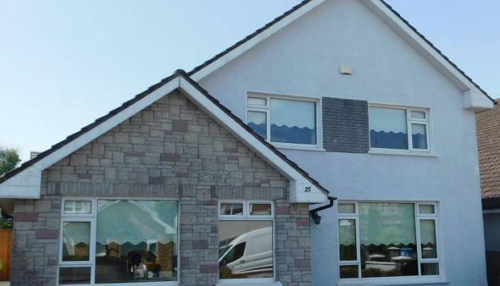 Ballintemple home with attic conversion and less grass to cut