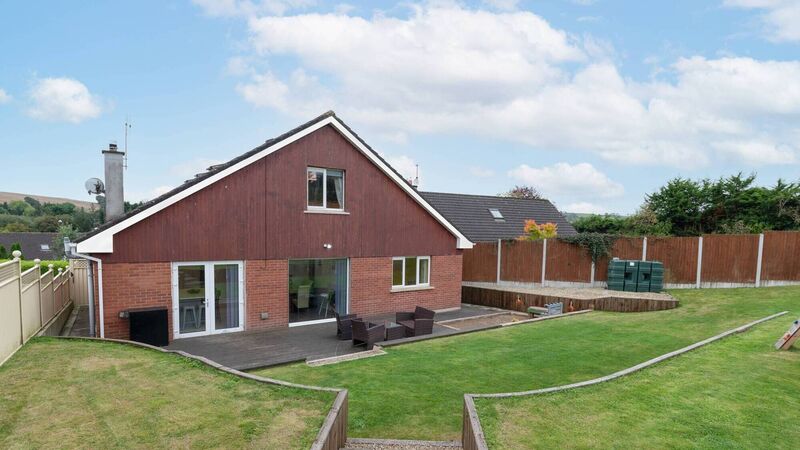 You'll be pleasantly surprised by the rear garden in this Kerry Pike home