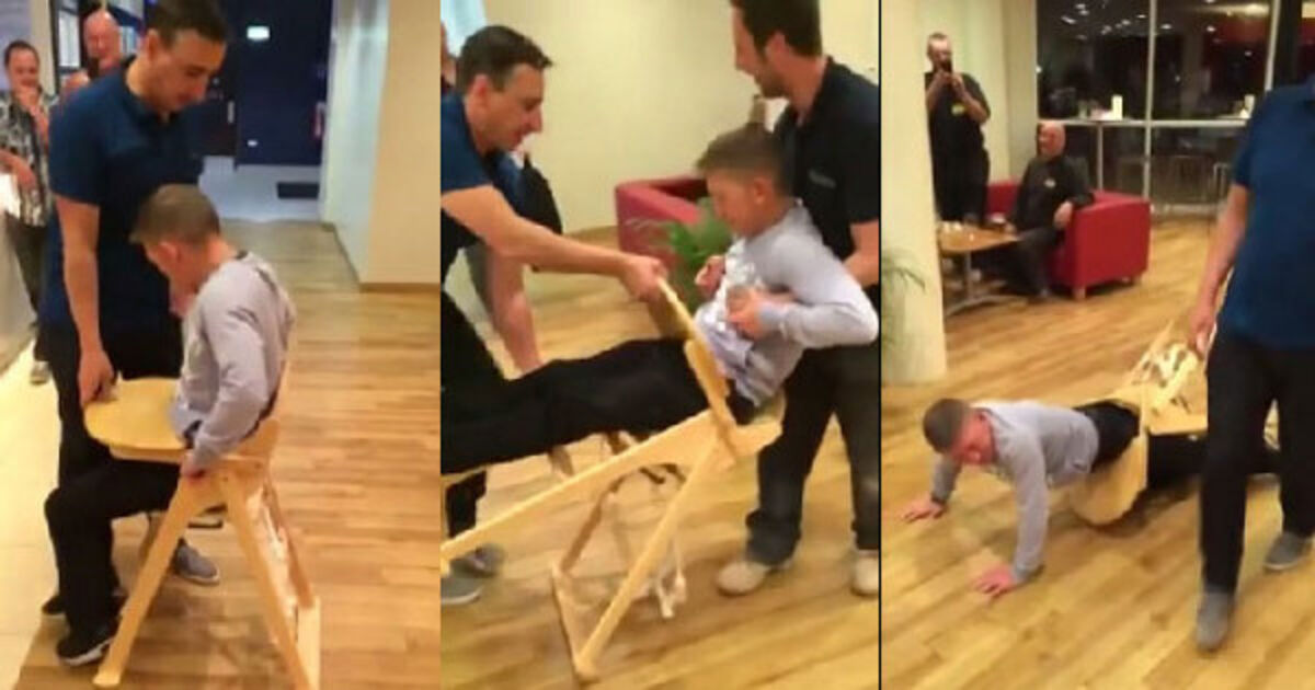 VIDEO: An adult man got himself stuck in a high chair