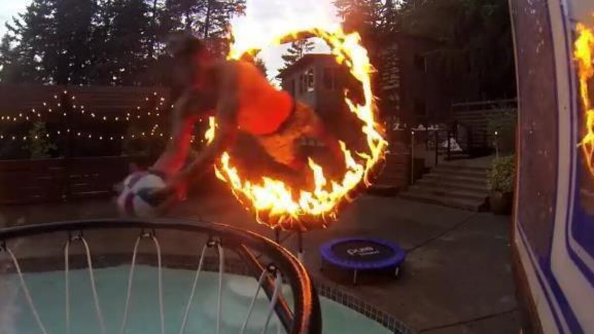 Insane fire-leaping basketball dunk