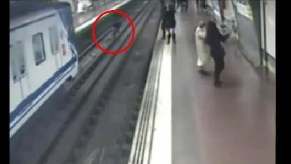 VIDEO: The dramatic moment a man is almost run over by a train