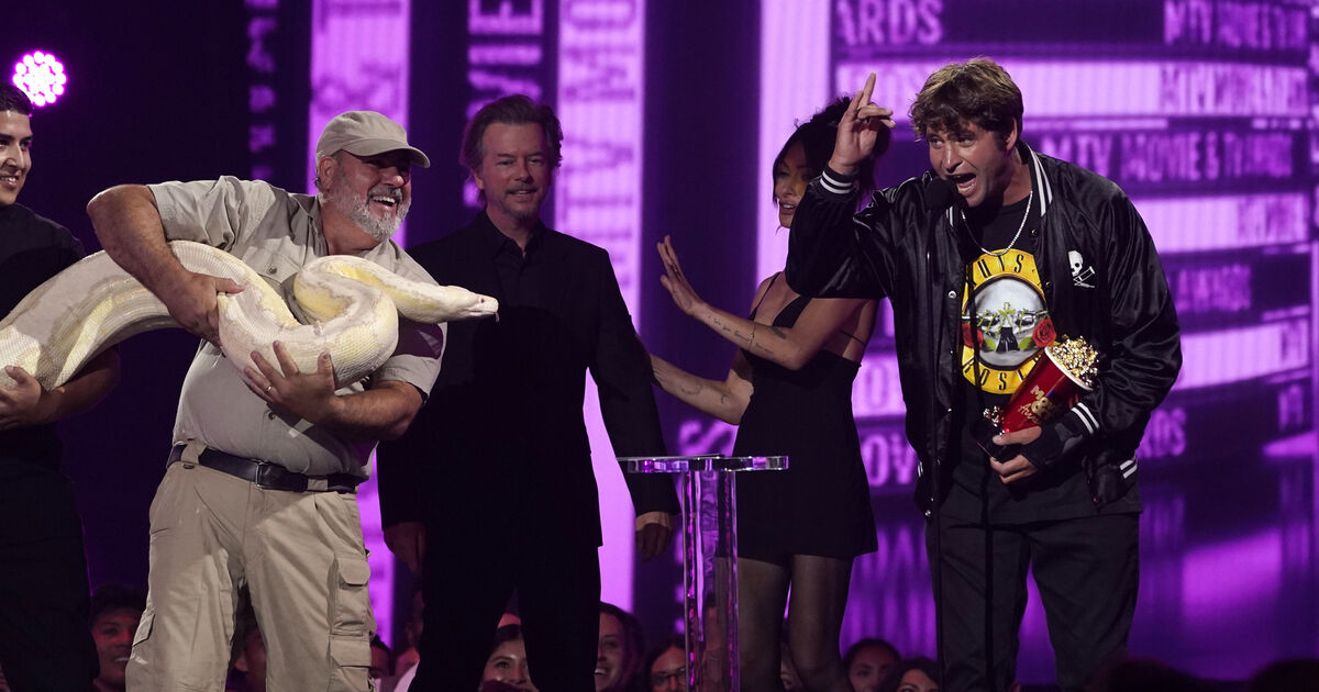 Jackass star joined onstage by enormous white snake at MTV Movie and TV ...