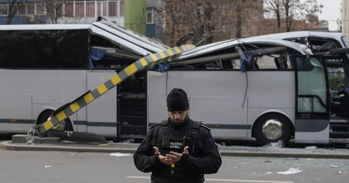 One dead and 22 hurt after coach crashes into height limit barrier in ...
