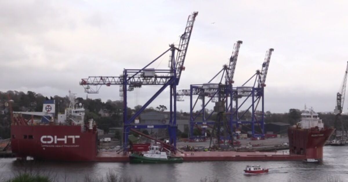 Check out the Albatross taking on three massive cranes at Cork Dockyard