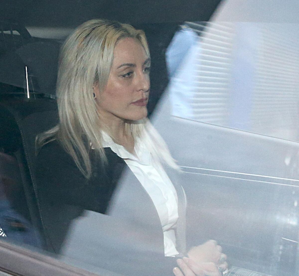 Woman appears in court over 2014 murders of two Dublin men