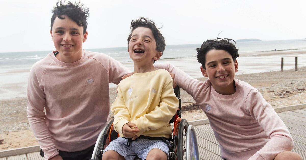 Adam King wears his heart — and hugs — on his sustainable sweatshirt
