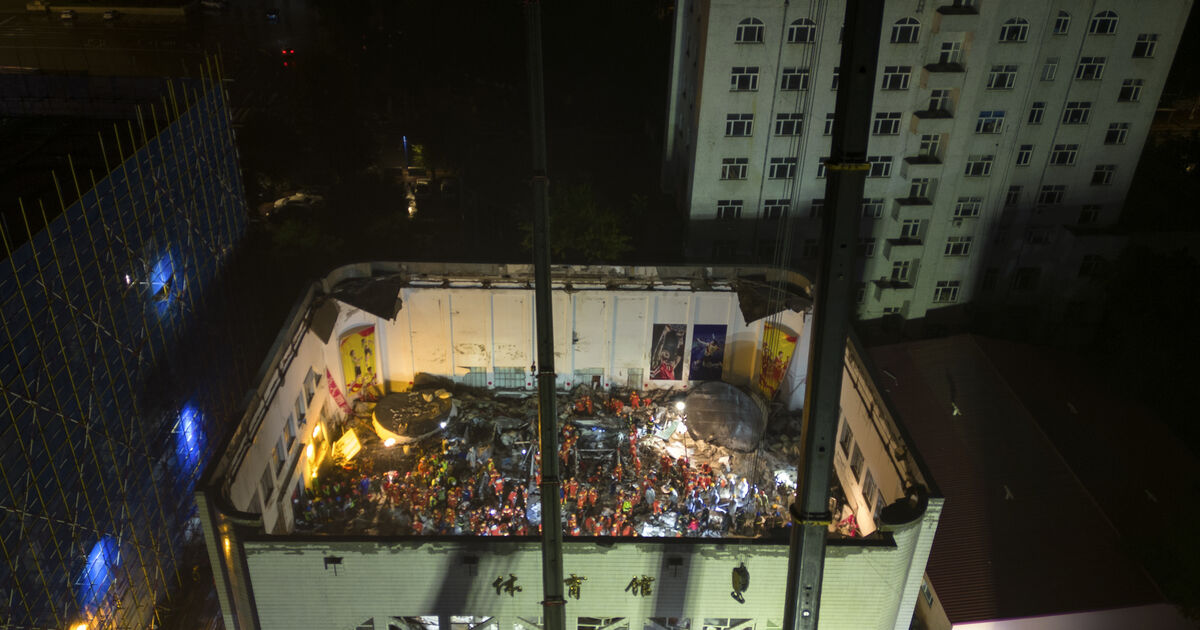 Eleven dead after school gym roof collapses in China