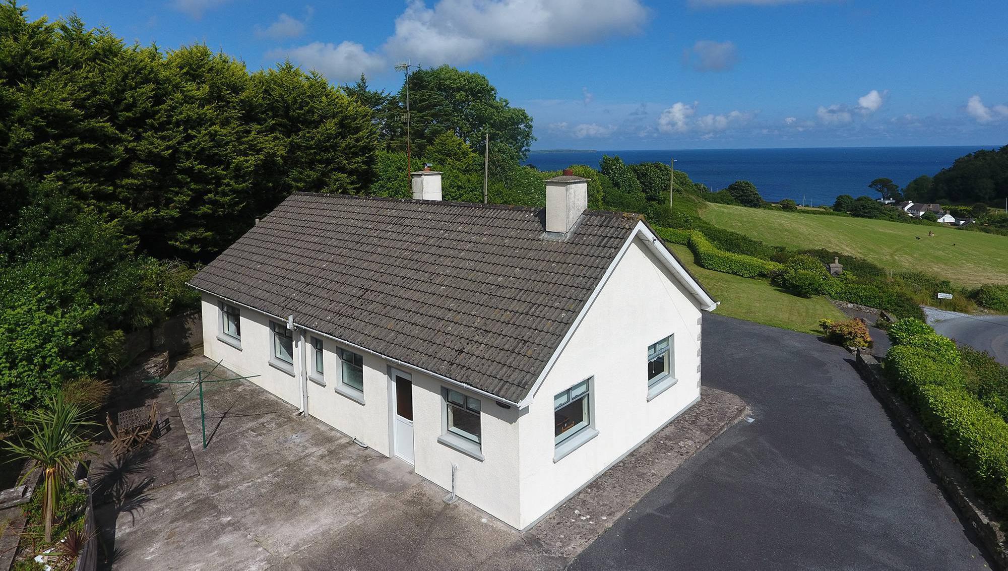 Bungalow on the hill in lovely Myrtleville comes with an acre