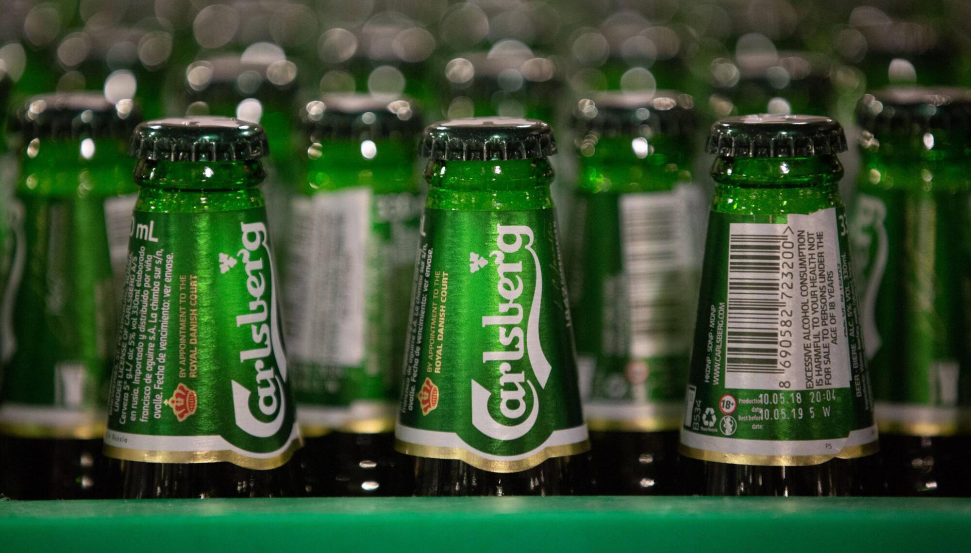 Carlsberg profit shows drinkers still swilling pricier beers