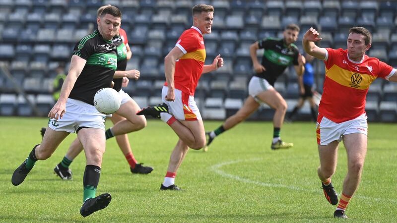 Nemo Rangers withstand Éire Óg fightback to reach knockout stages
