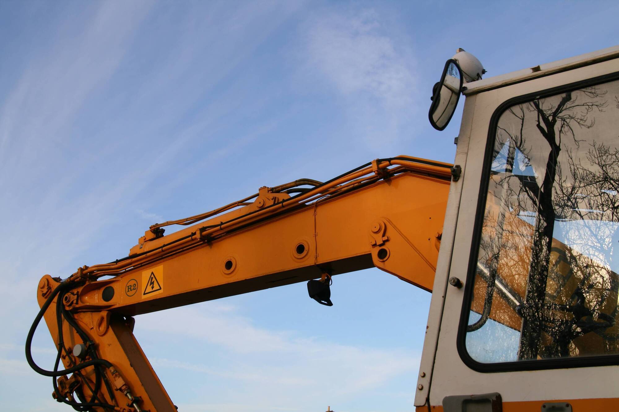 Construction worker whose lower leg was crushed by reversing digger ...