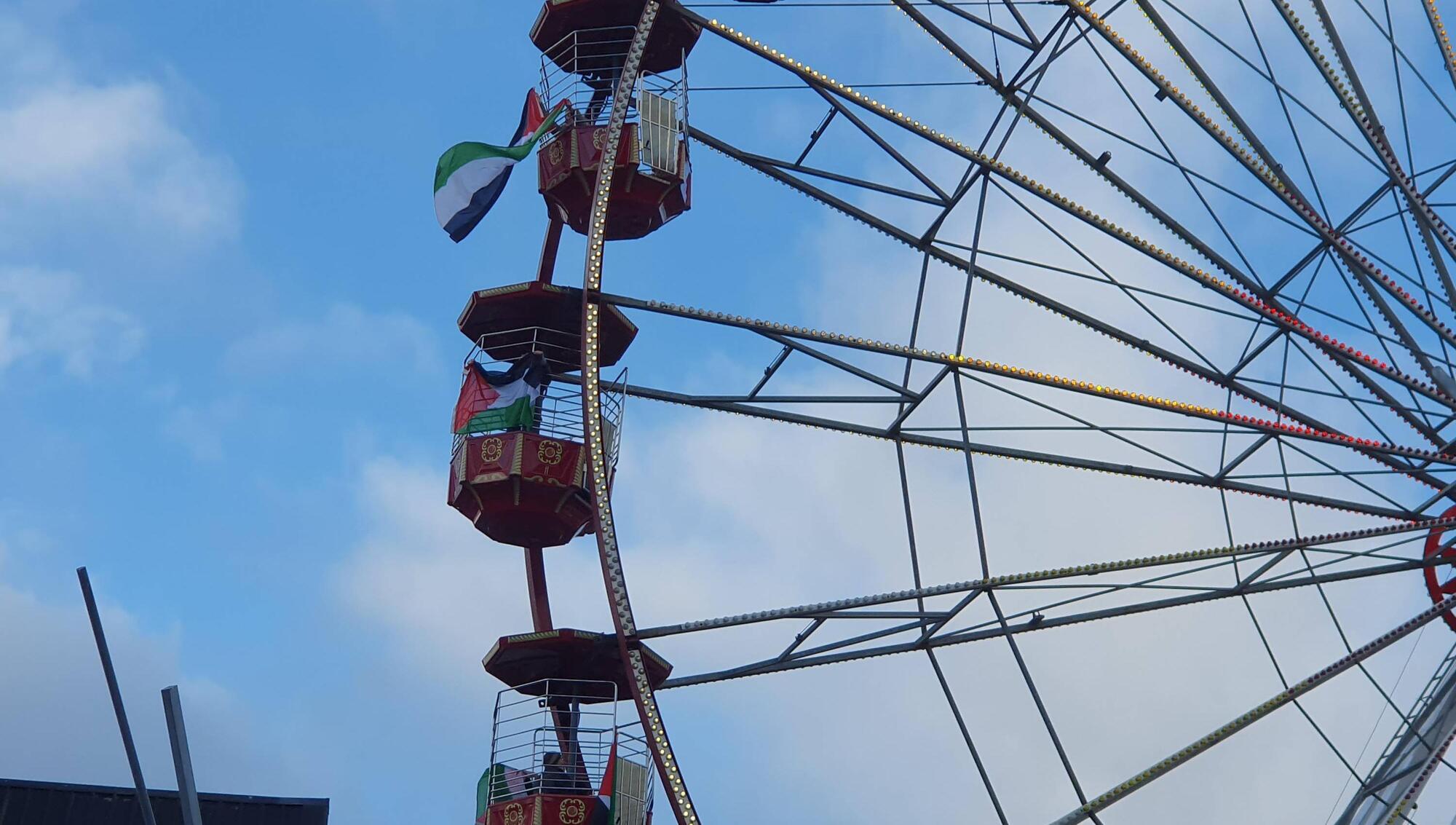 Flags fly from Ferris wheel in Cork as protesters call for end to war ...