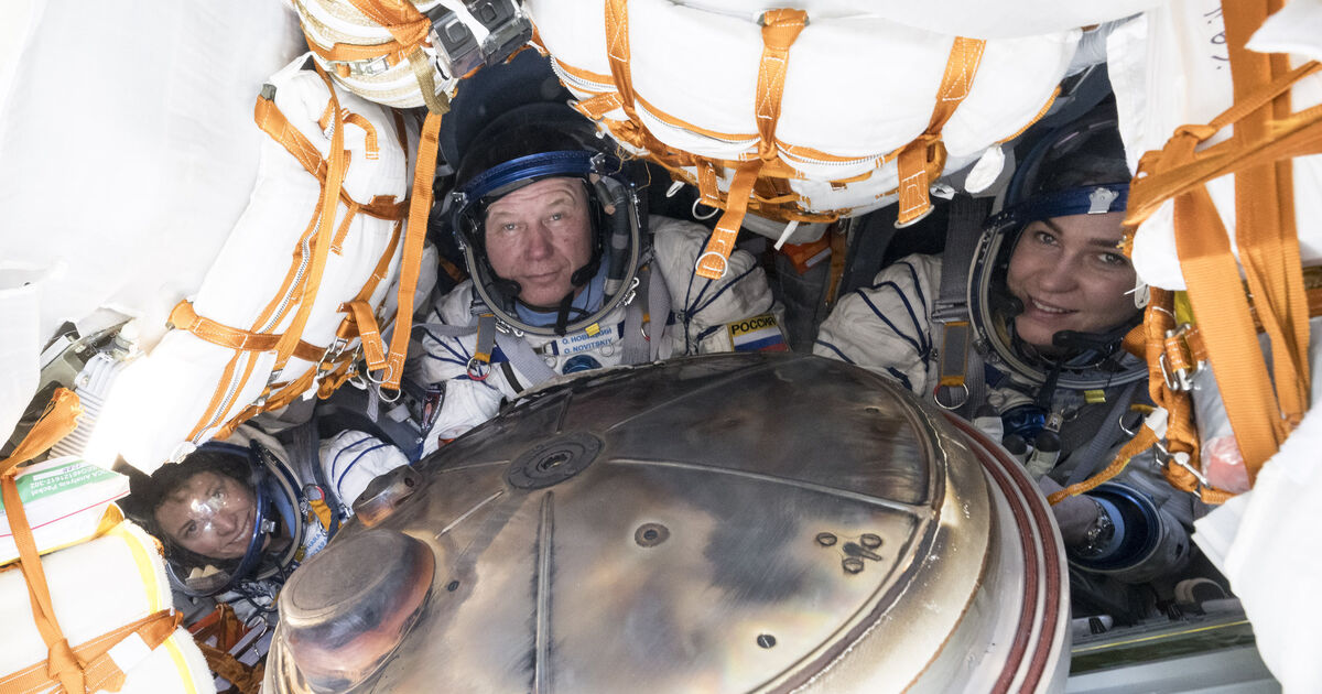 Soyuz capsule carrying three crew from space station lands safely in ...