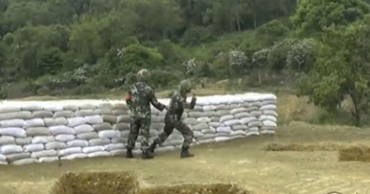 Chinese soldier saved by instructor after dropping live grenade