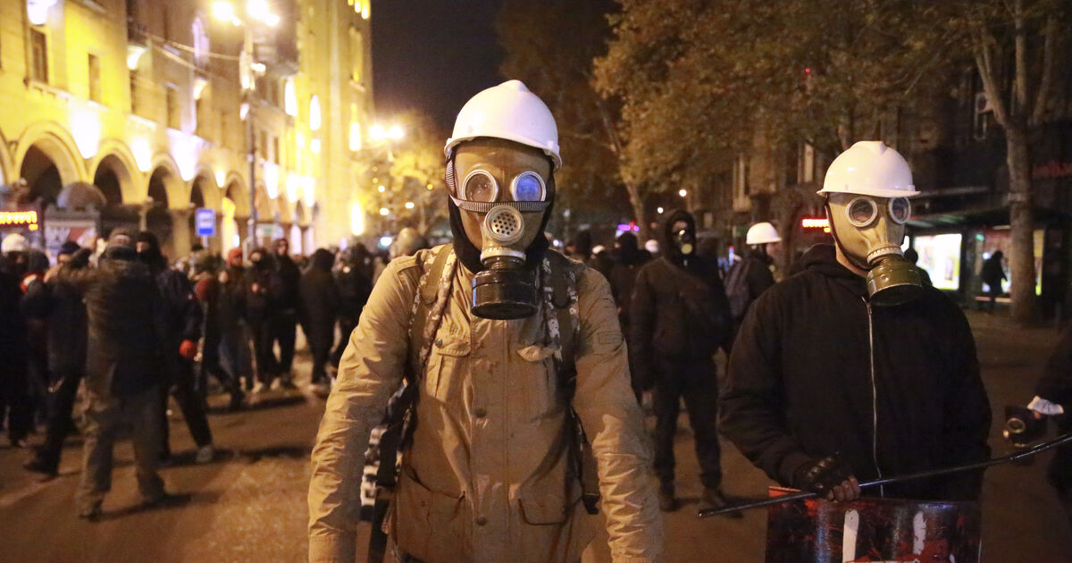 Opposition leader arrested during police raid on offices amid unrest in ...