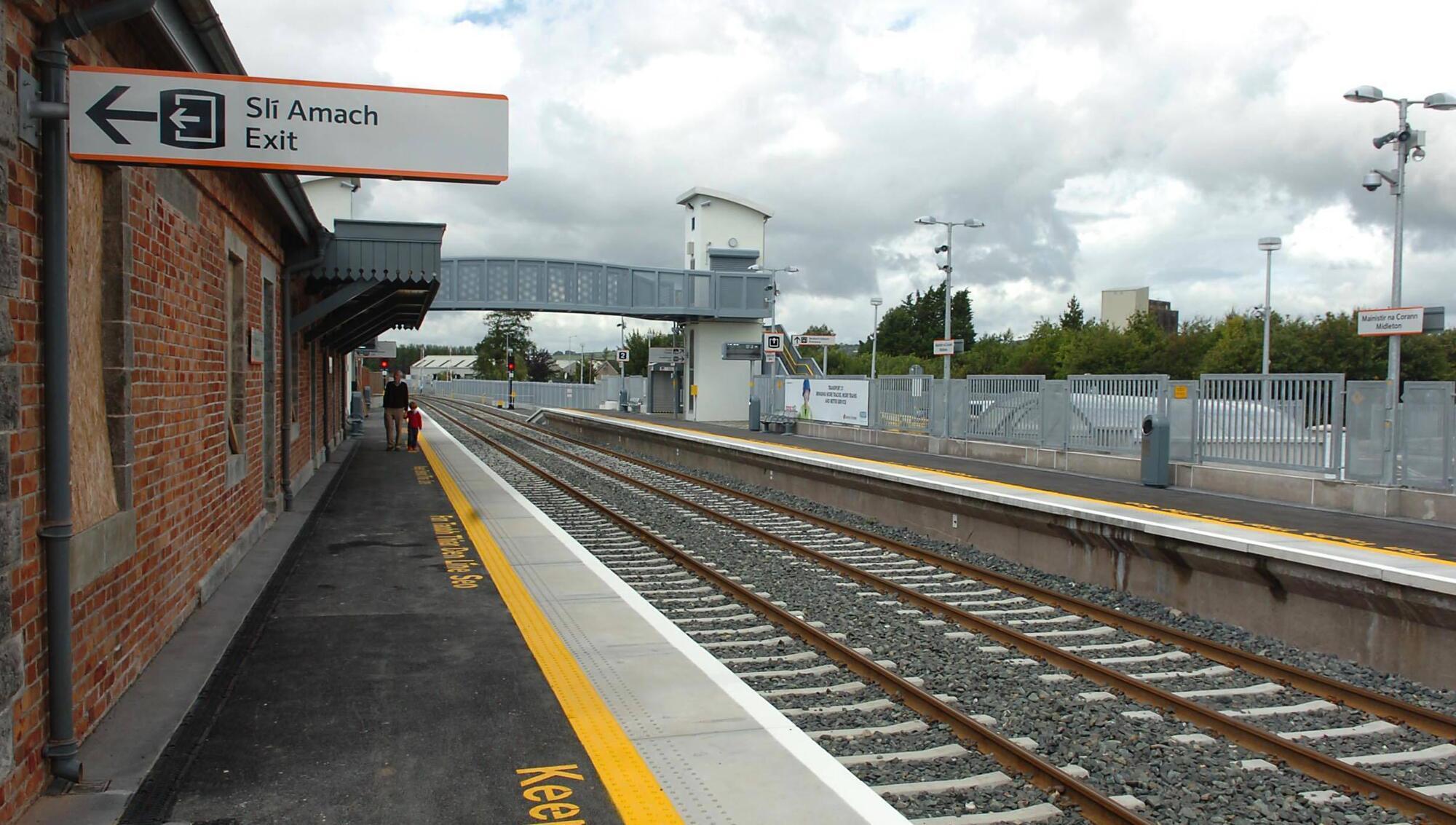Passengers forced to cross railway tracks to exit station due to locked ...