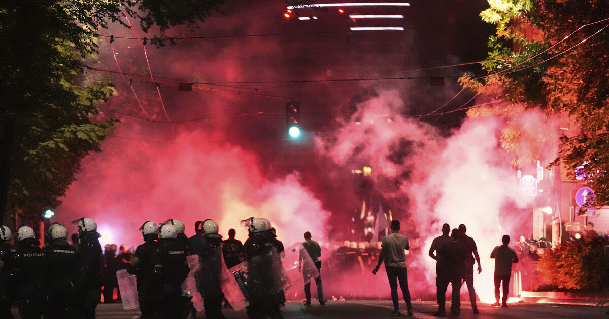 Serbian riot police fire tear gas at anti-government protesters