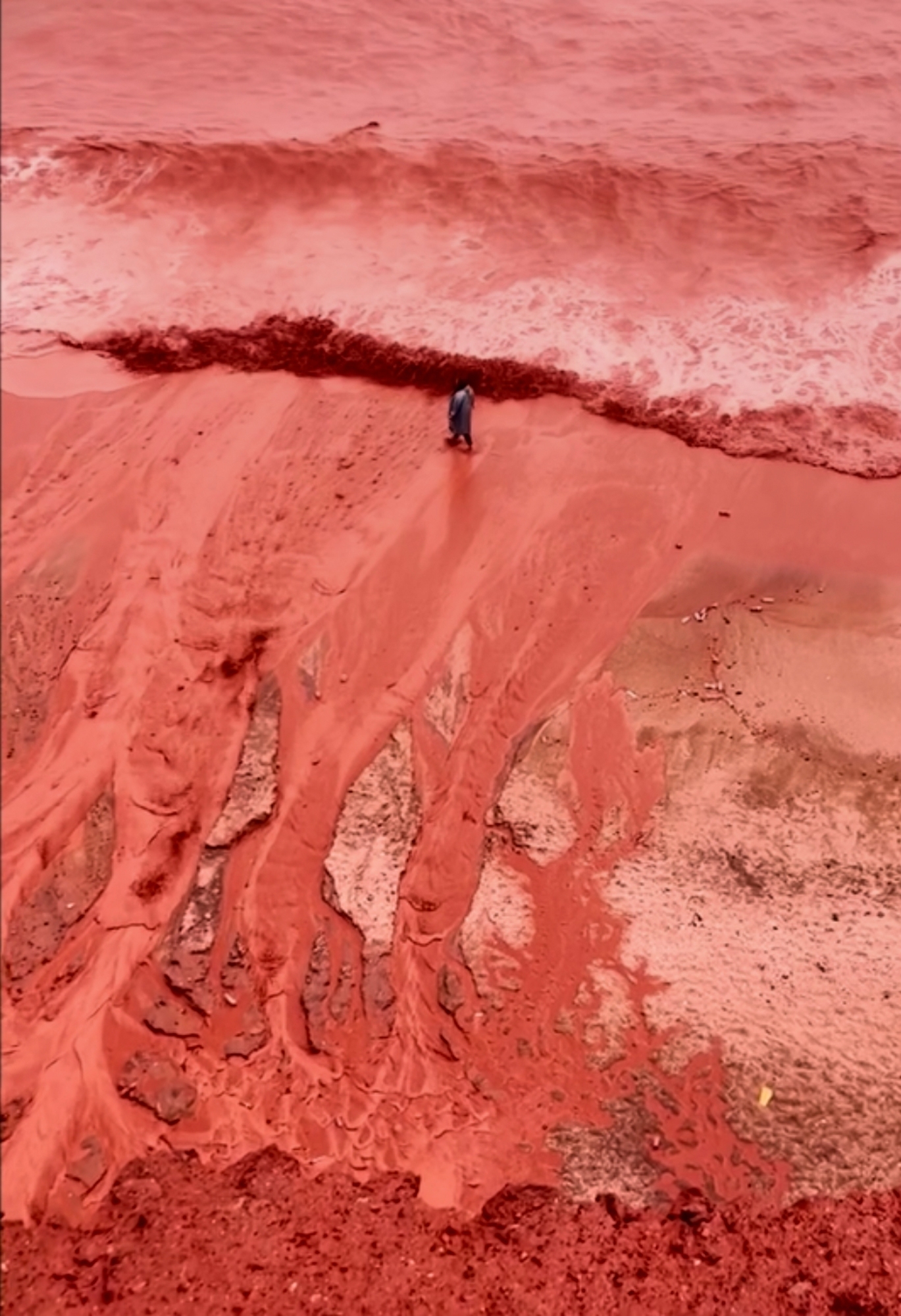Rain creates crimson spectacle on Iran’s Hormuz Island