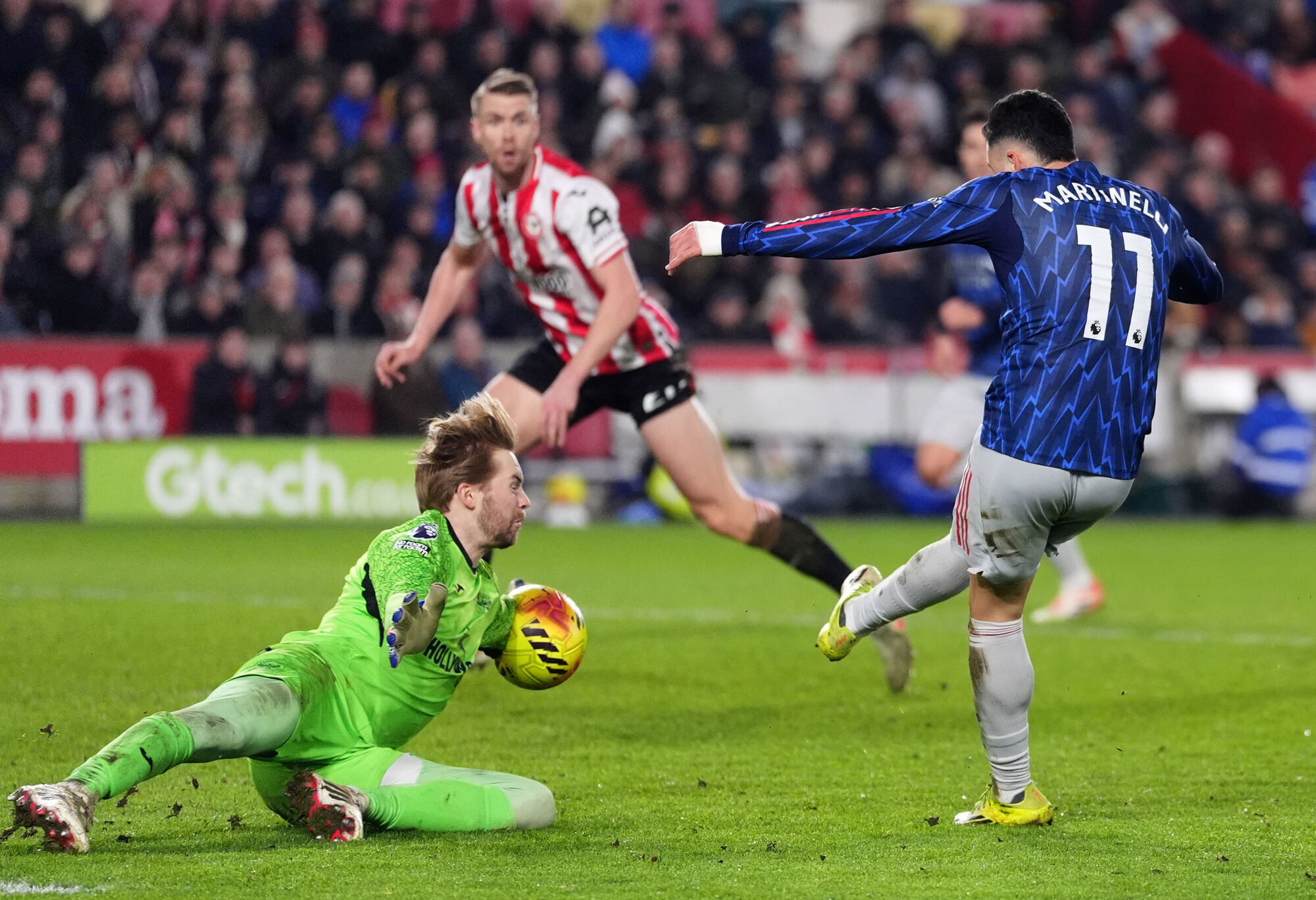 Lewis-Potter header denies Gunners and narrows gap at top to four points